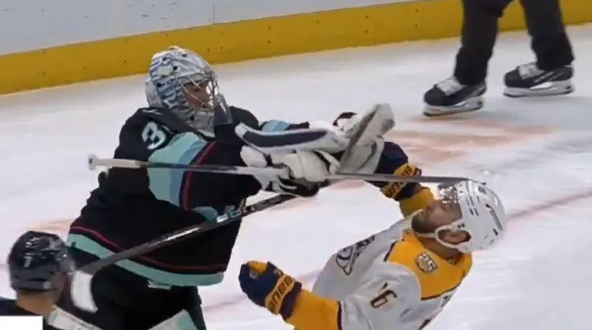 Kraken's Grubauer Delivers Insane Hit on Forward in his Crease