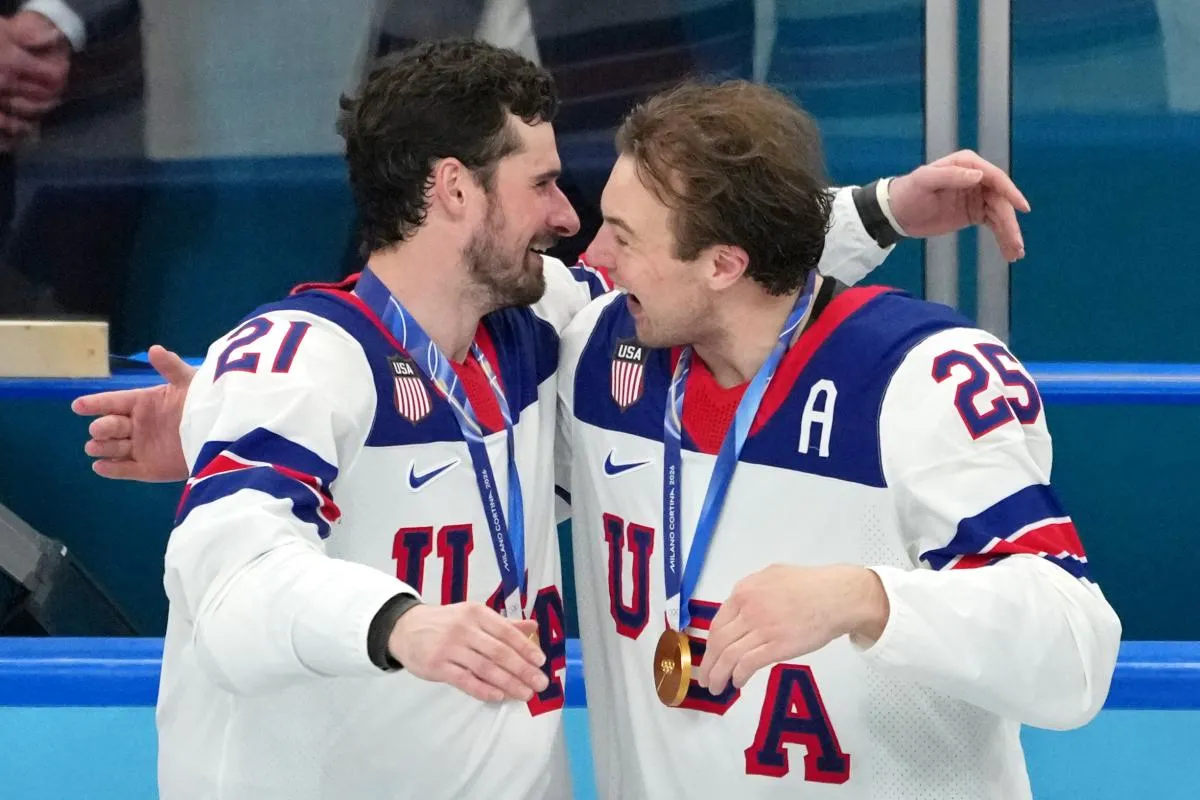 Team USA gold celebration leaves Red Wings captain Dylan Larkin's ...